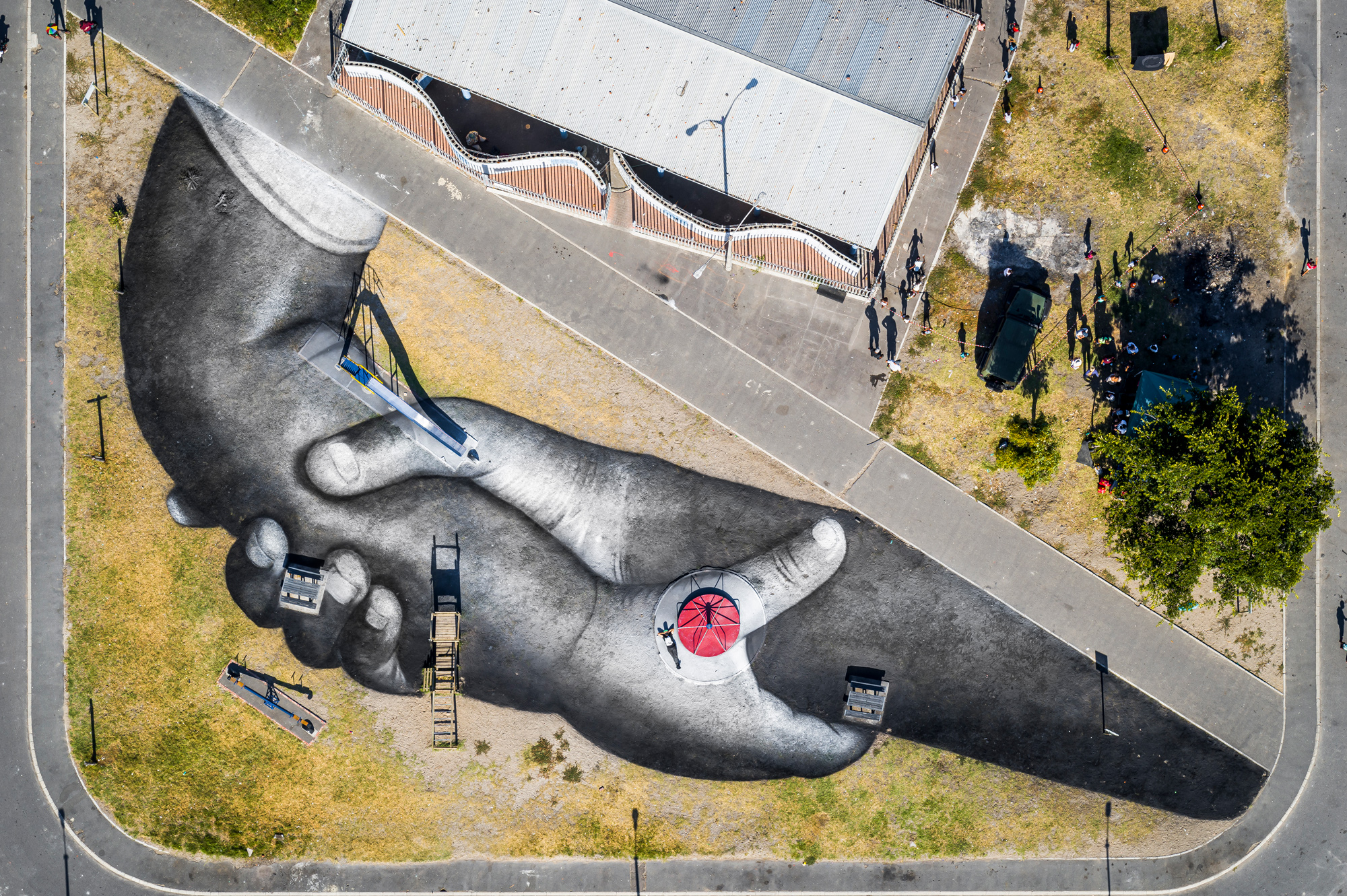 Beyond Walls by Saype | Eco-riendly art sparks conscious dialogue